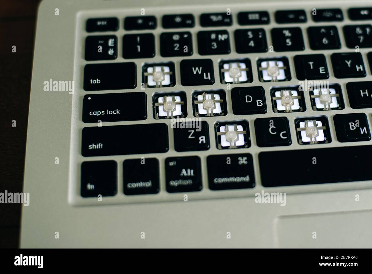 screwdriver and spare parts from a laptop. Keyboard, brush, keys ...