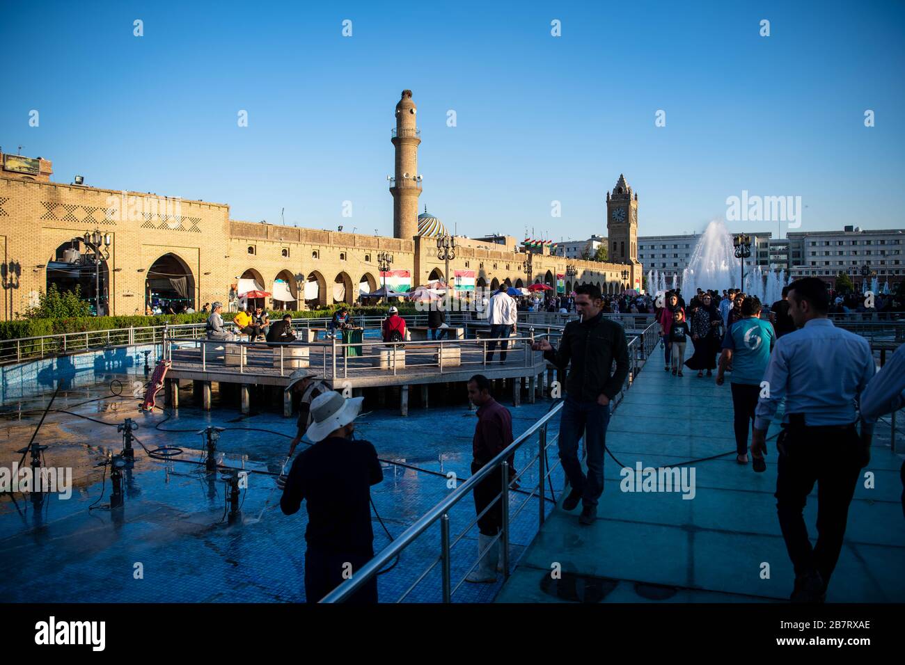 Iraq, Iraqi Kurdistan, Arbil, Erbil. On the park Shar men ares walking ...
