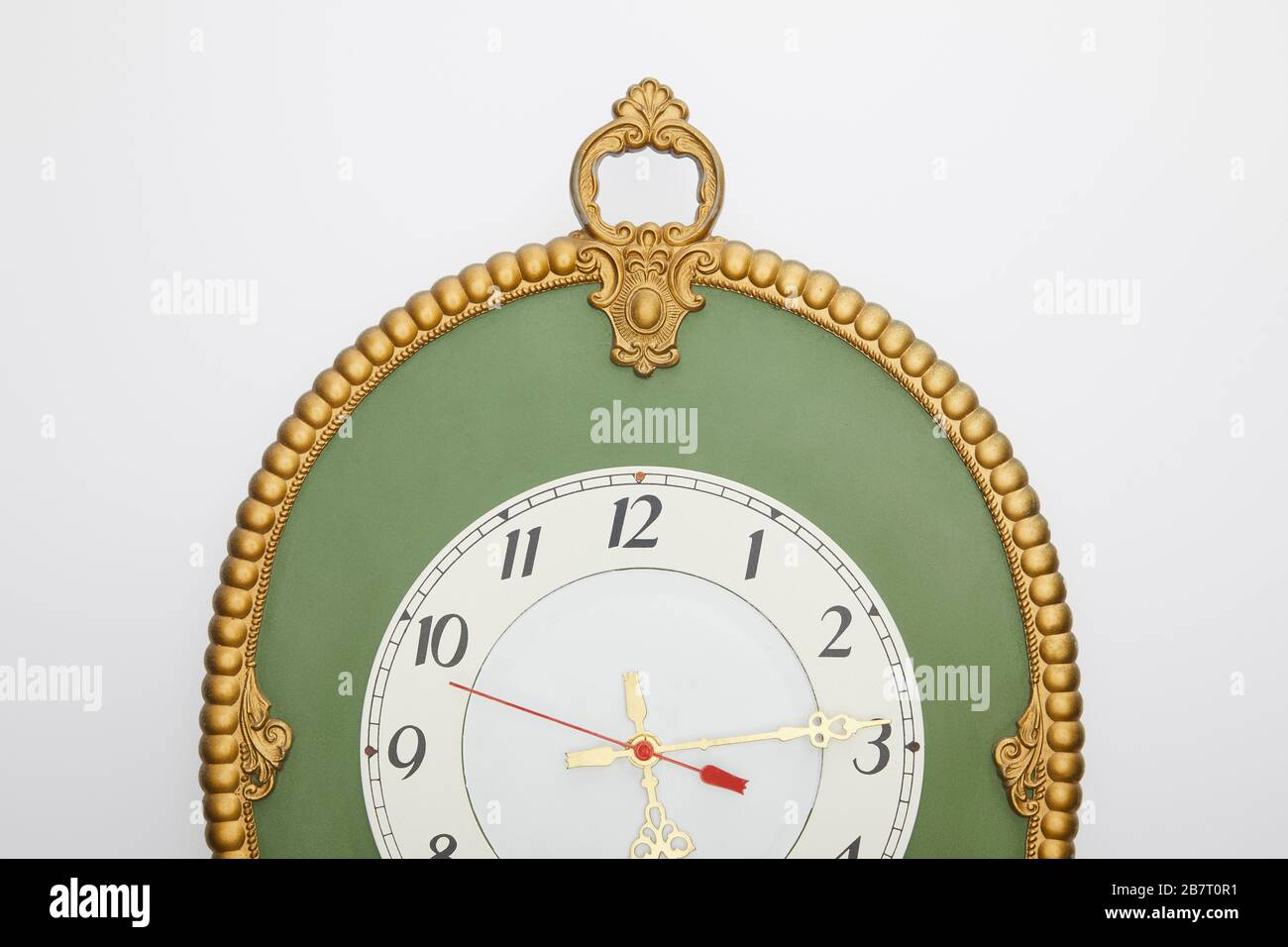 top view of classic clock on white background Stock Photo - Alamy
