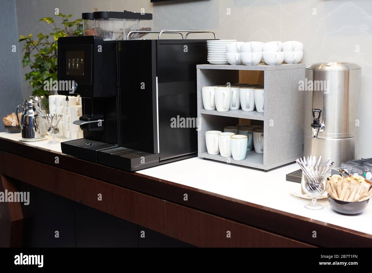 Coffee, cups on catering table at conference or wedding banquet. Group ...