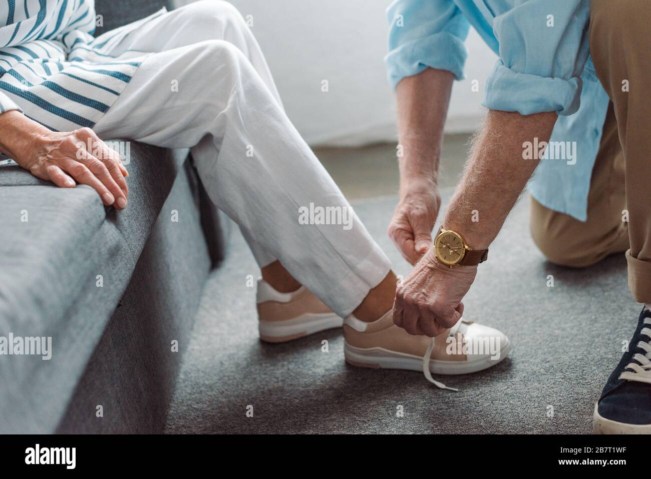 Man lacing his shoe hi-res stock photography and images - Alamy