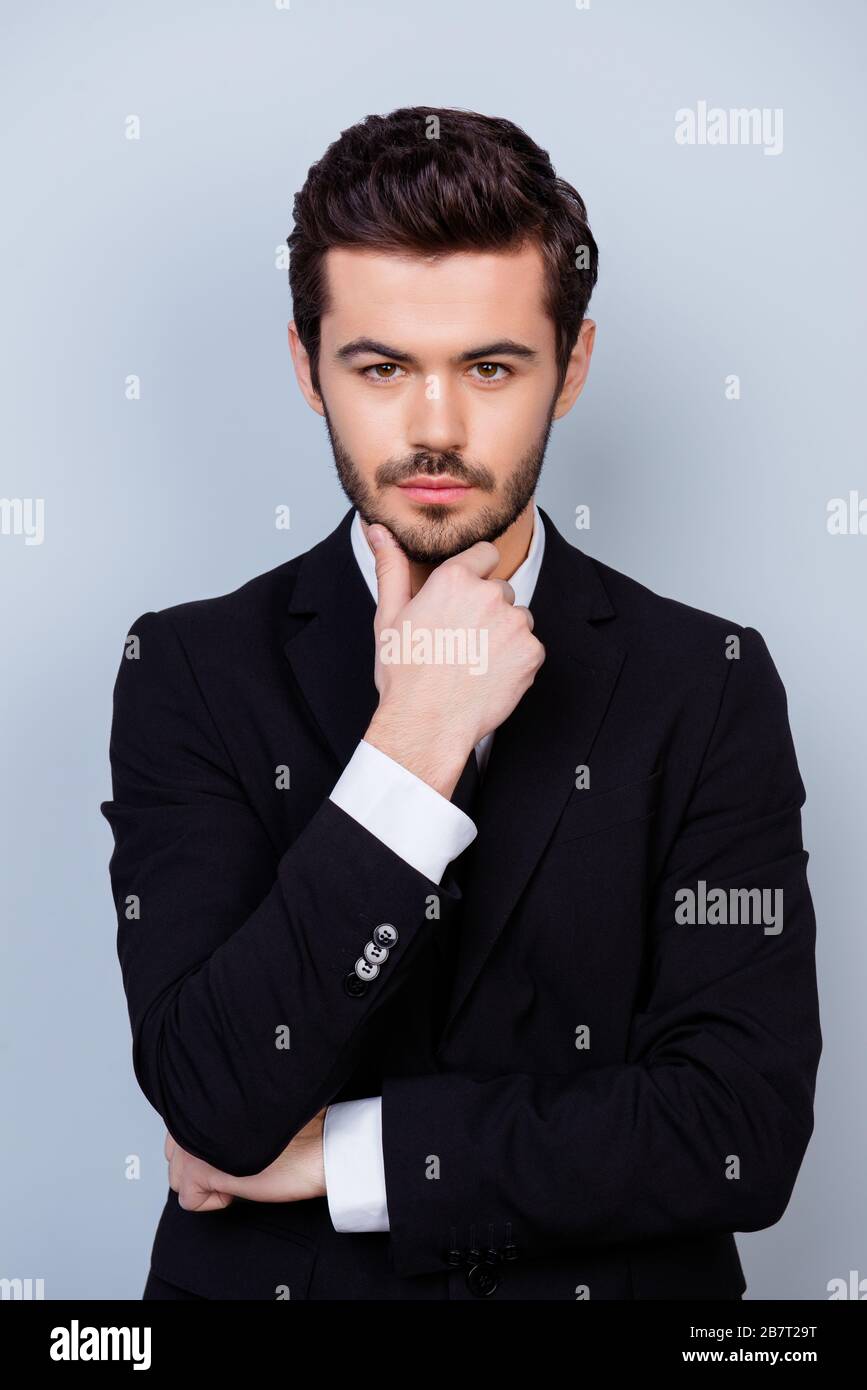 Vertical photo of strict serious minded boss in formal clothes touching ...