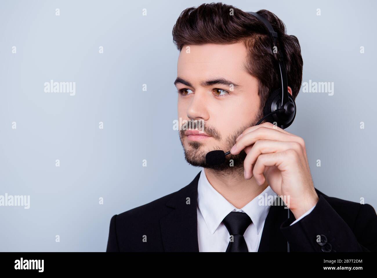 Serious male receptionist hi-res stock photography and images - Alamy
