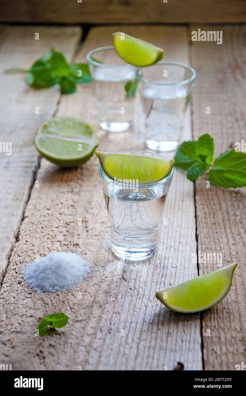 Alcohol Shot Drink. Silver Tequila with Lime, Salt and Green on the ...