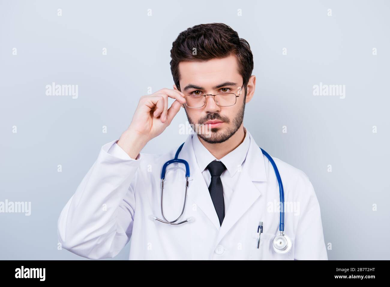 Portrait concentrated male doctor hi-res stock photography and images ...