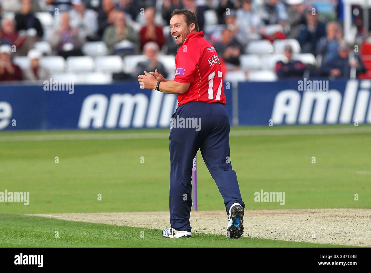 Graham Napier of Essex celebrates taking the wicket of Tim Ambrose ...
