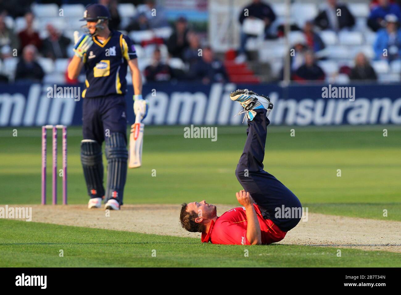 Graham Napier of Essex Eagles takes a tumble while fielding Stock Photo ...