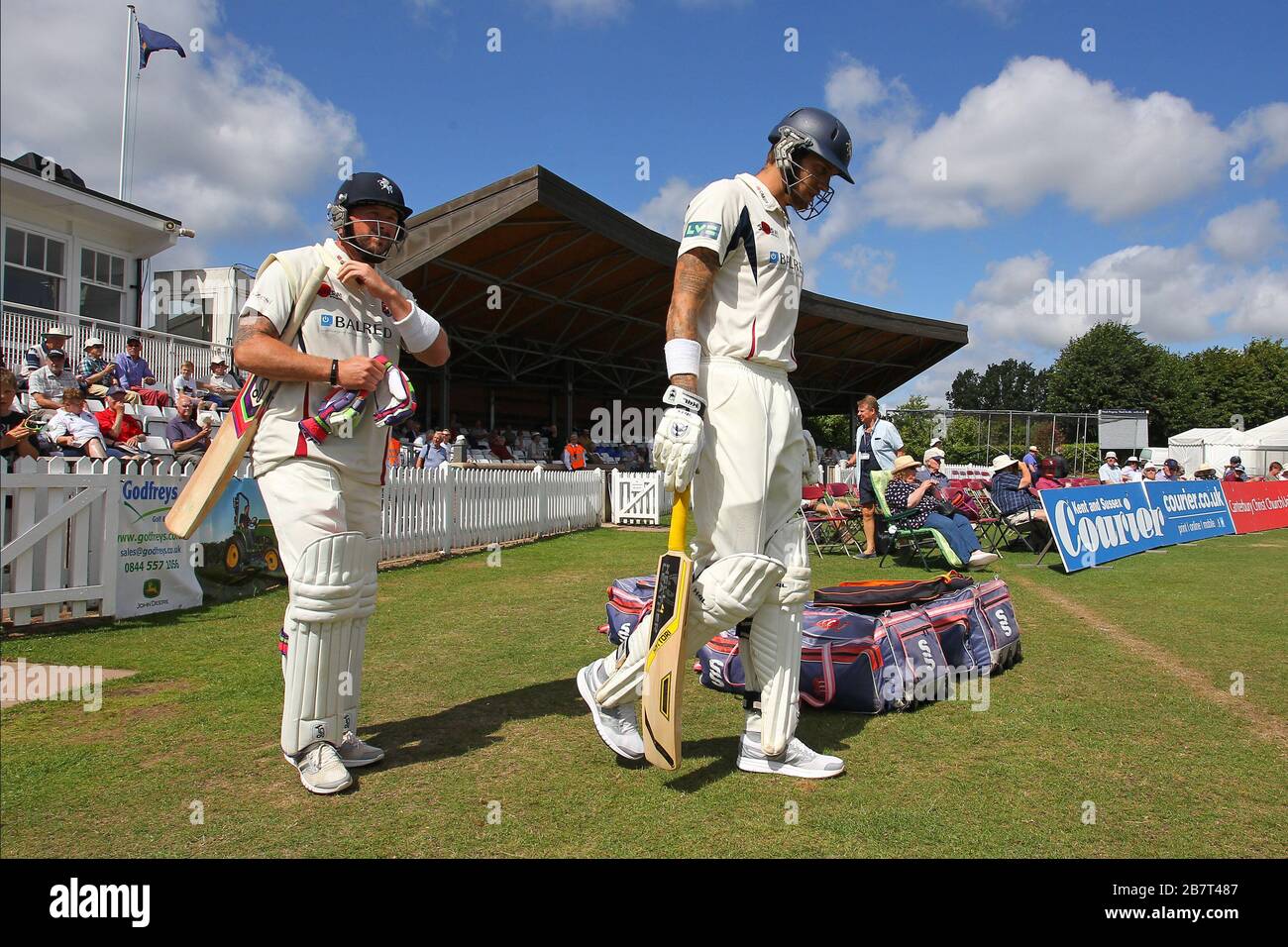 Kent batsmen Ben Harmison (R) and Darren Stevens walk out ahead of play ...