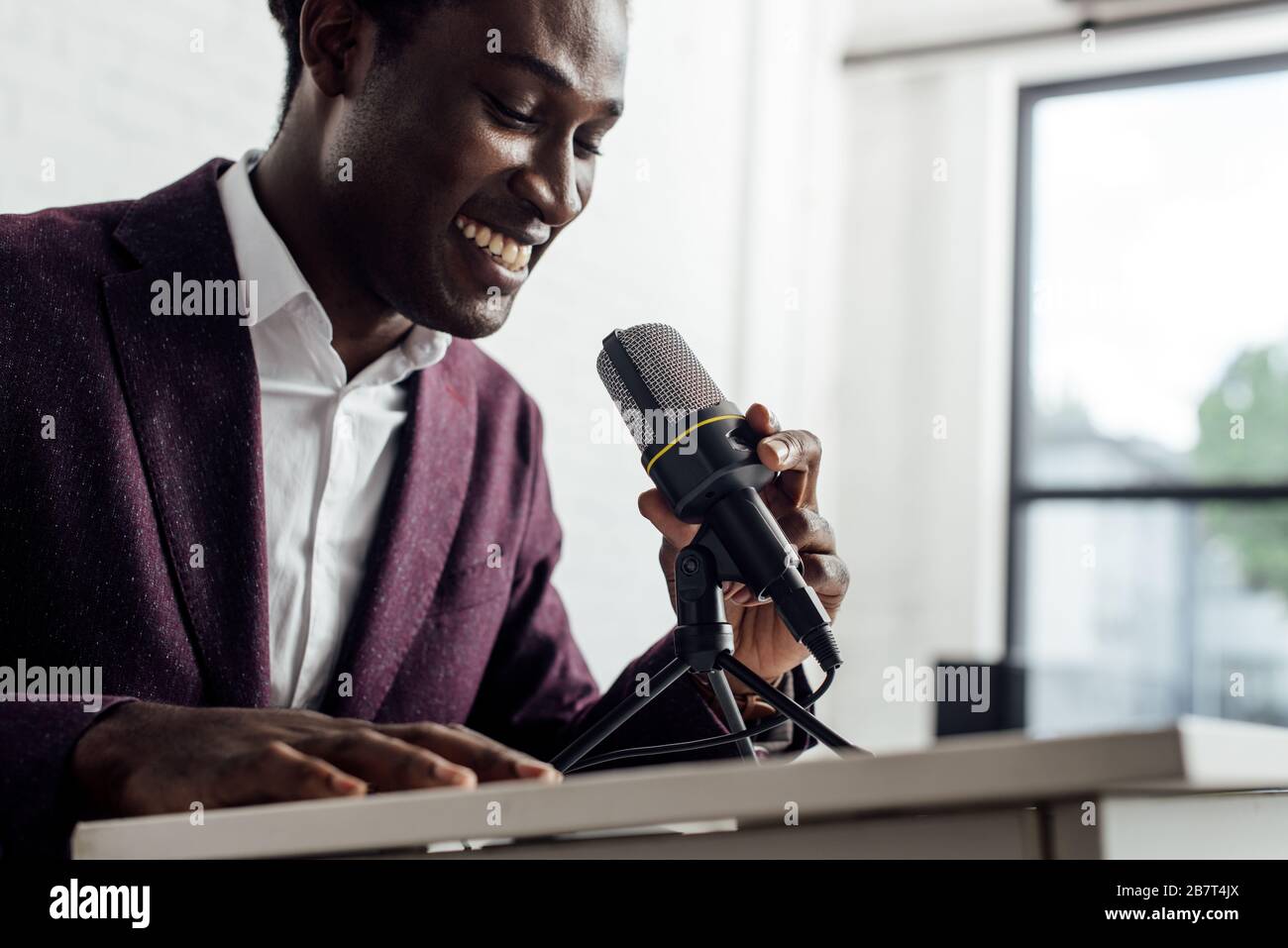 African american man speaking at podium hi-res stock photography and ...