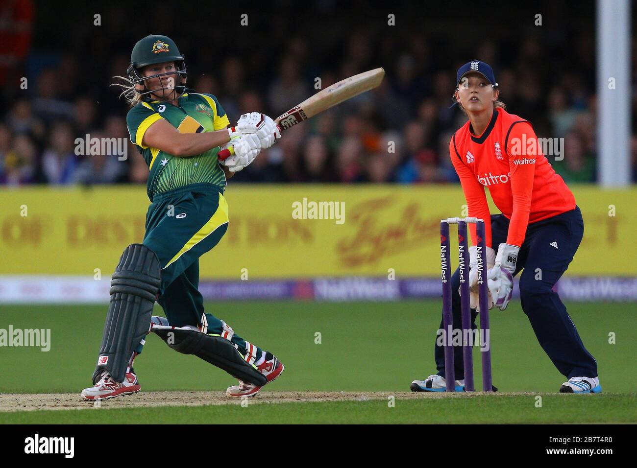 Meg Lanning hits four runs for Australia as Sarah Taylor looks on from ...
