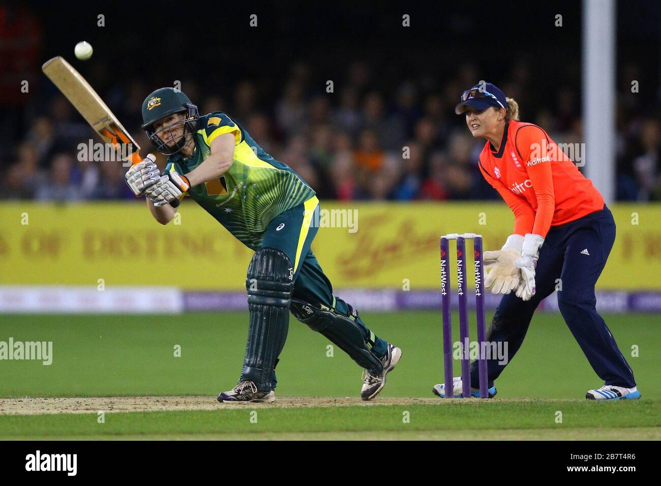 Alex Blackwell in batting action for Australia as Sarah Taylor looks on ...