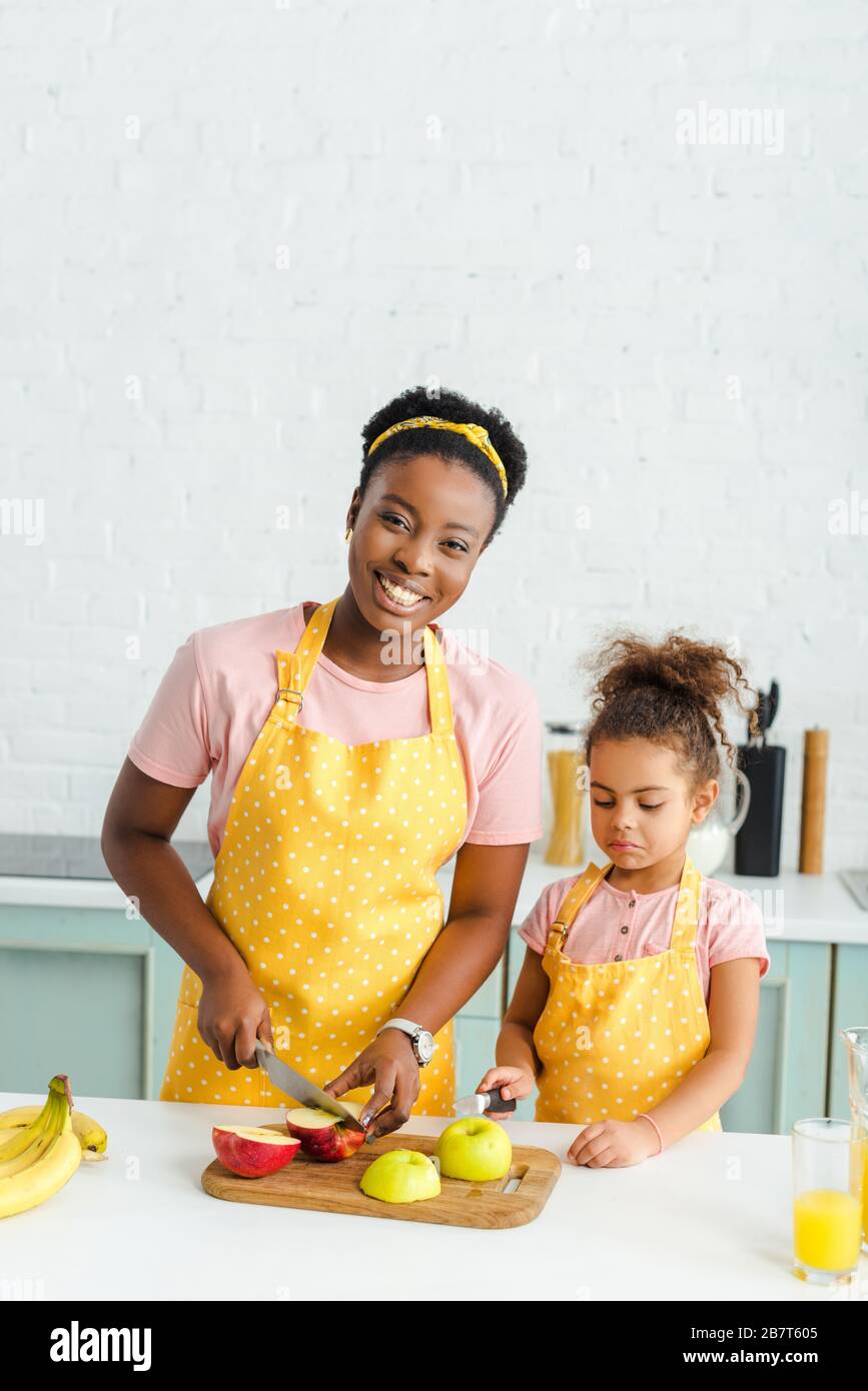 African mother apple child hi-res stock photography and images - Alamy