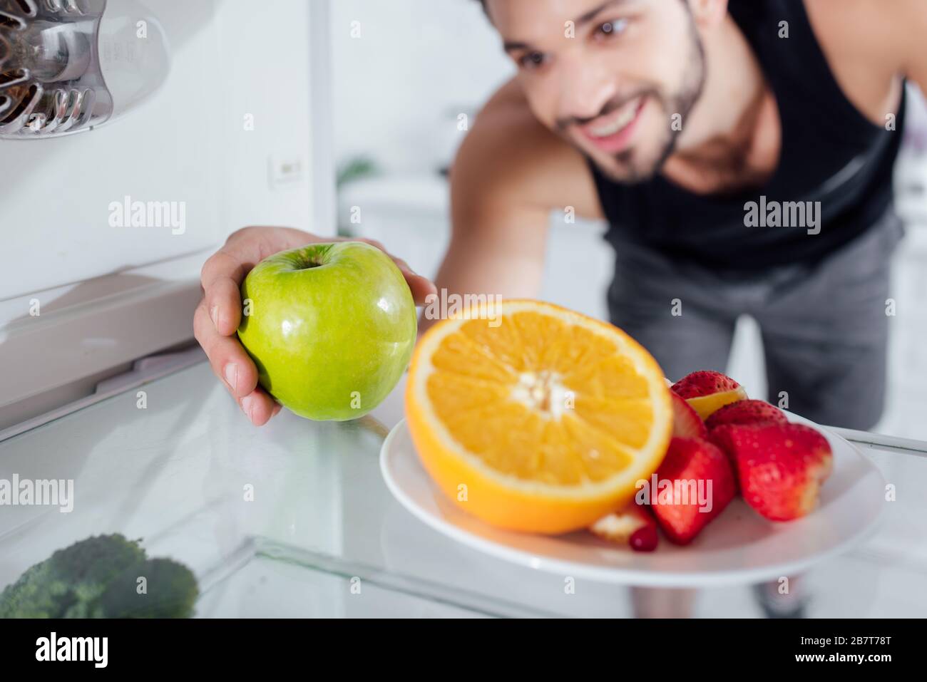 Taking apple handsome man hi-res stock photography and images - Alamy