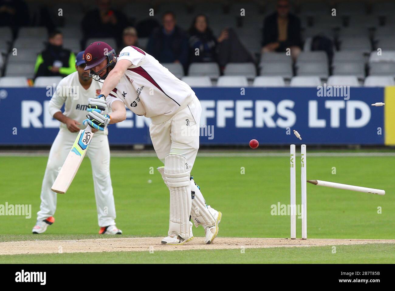 Rob Keogh of Northamptonshire CCC is bowled out by Jamie Porter Stock ...