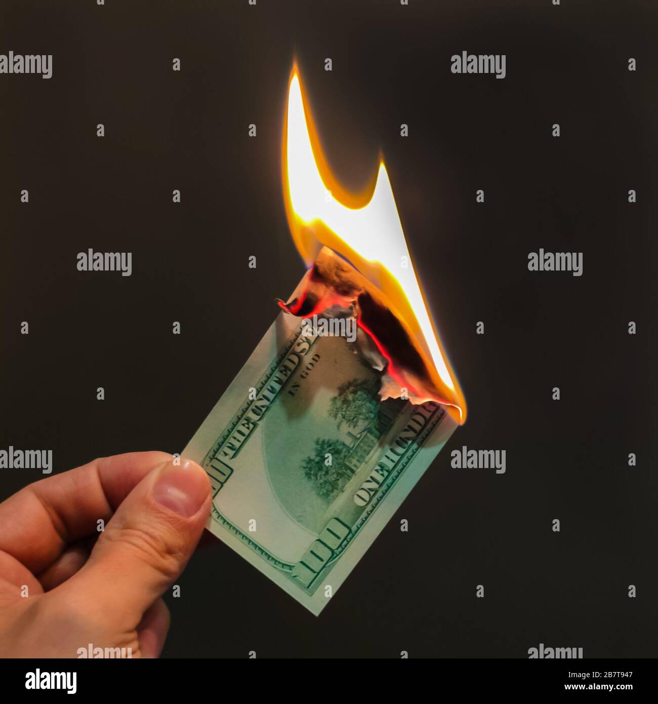 Man Burning Money High Resolution Stock Photography and Images - Alamy