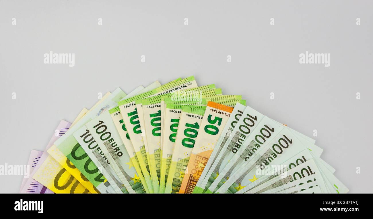 Euro banknotes of different denominations on a white background Stock ...