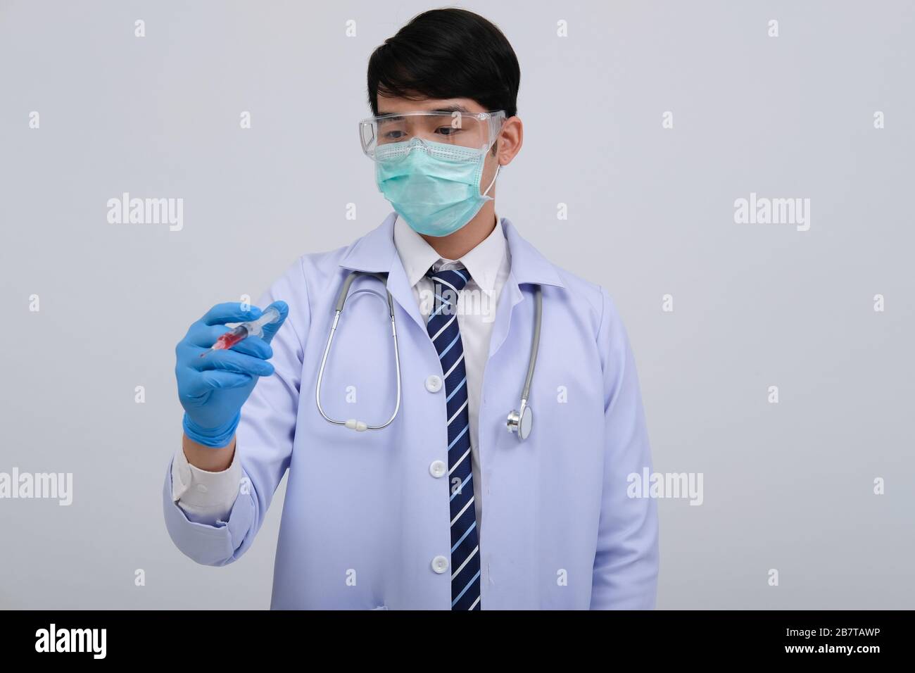 doctor physician practitioner with medicine syringe. medical injection ...