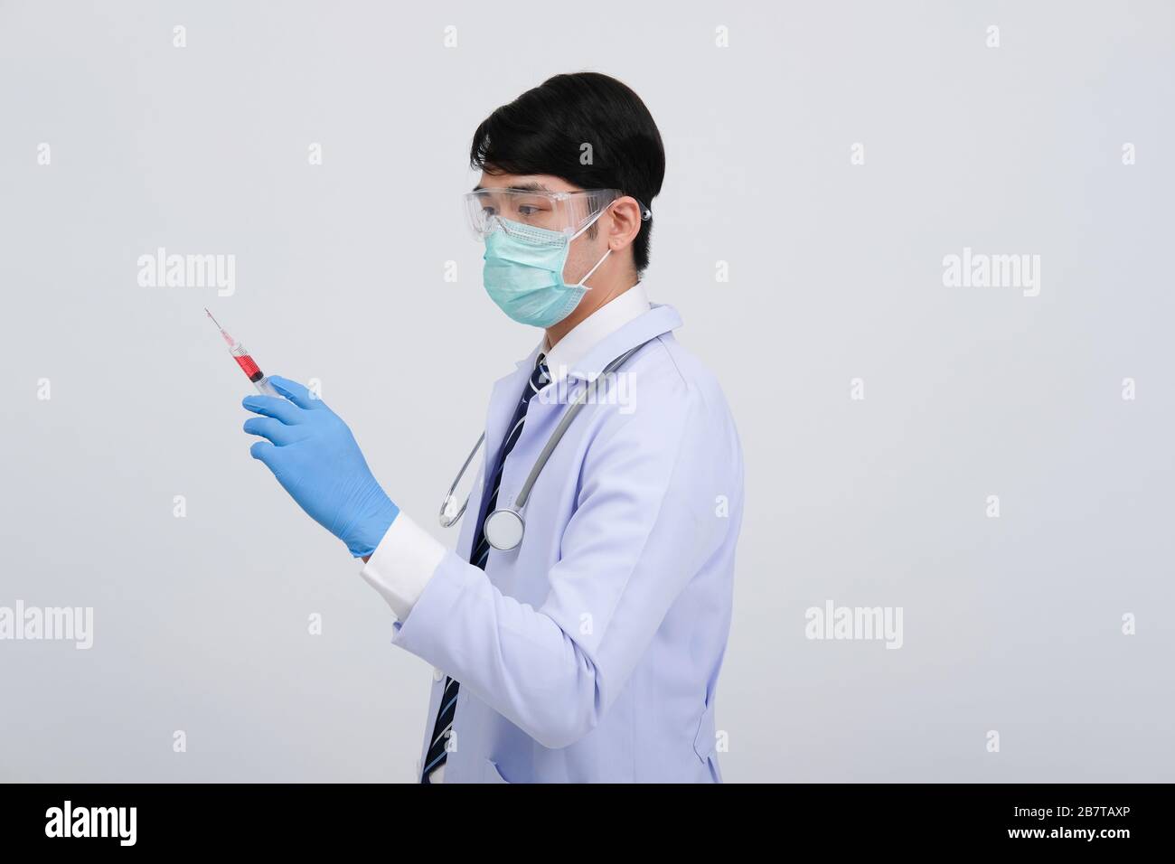 doctor physician practitioner with medicine syringe. medical injection ...