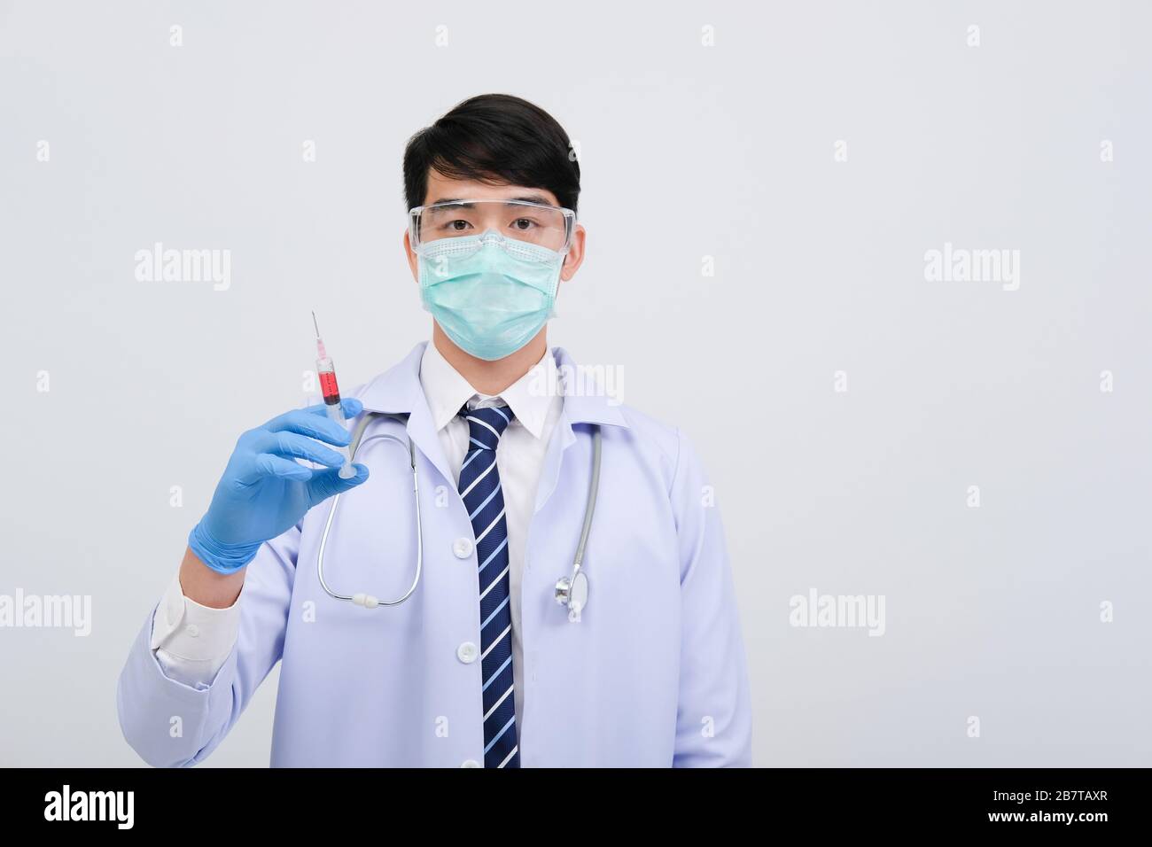 doctor physician practitioner with medicine syringe. medical injection ...