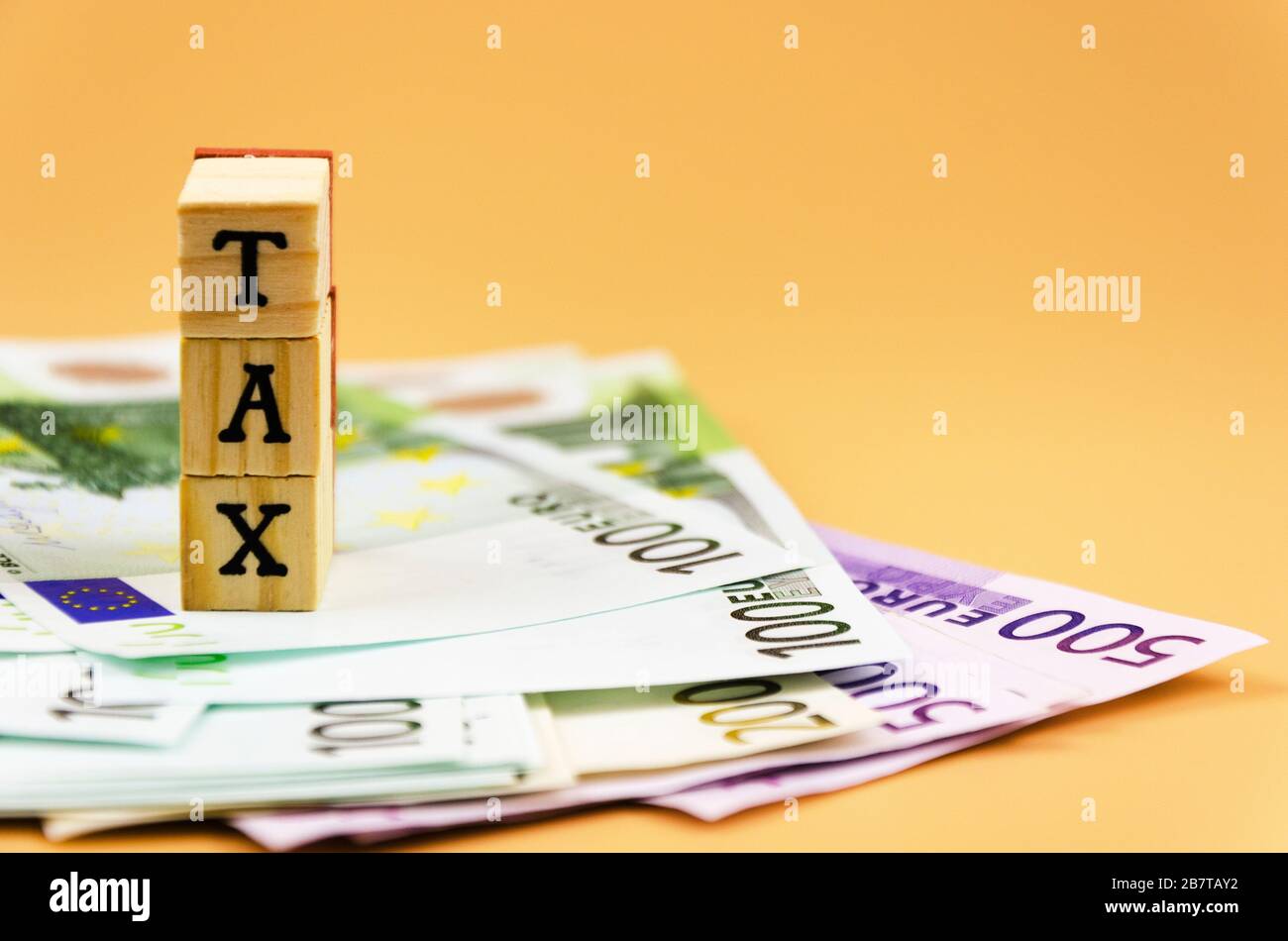 the word tax and the currency of the European Union of different ...