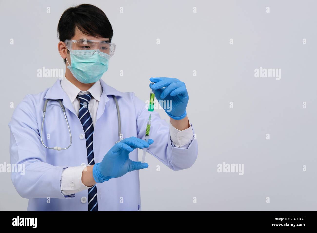 doctor physician practitioner with medicine syringe vial ampule ...