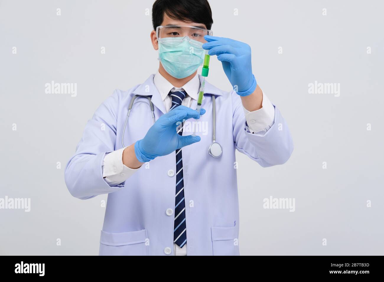 doctor physician practitioner with medicine syringe vial ampule ...