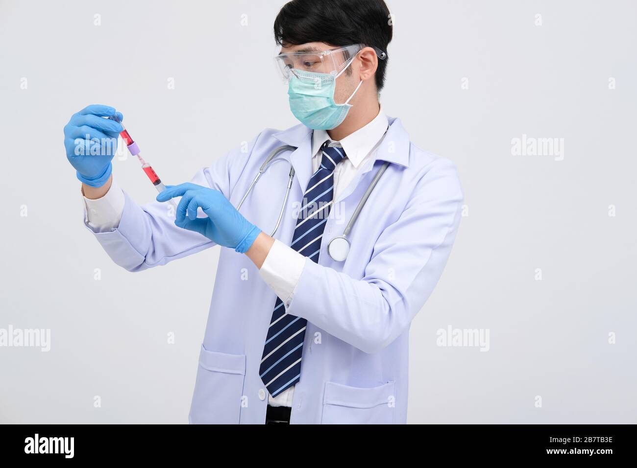 doctor physician practitioner with medicine syringe vial ampule ...