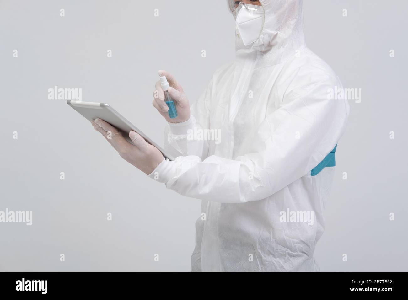 man scientist wearing biological protective uniform suit clothing, mask ...
