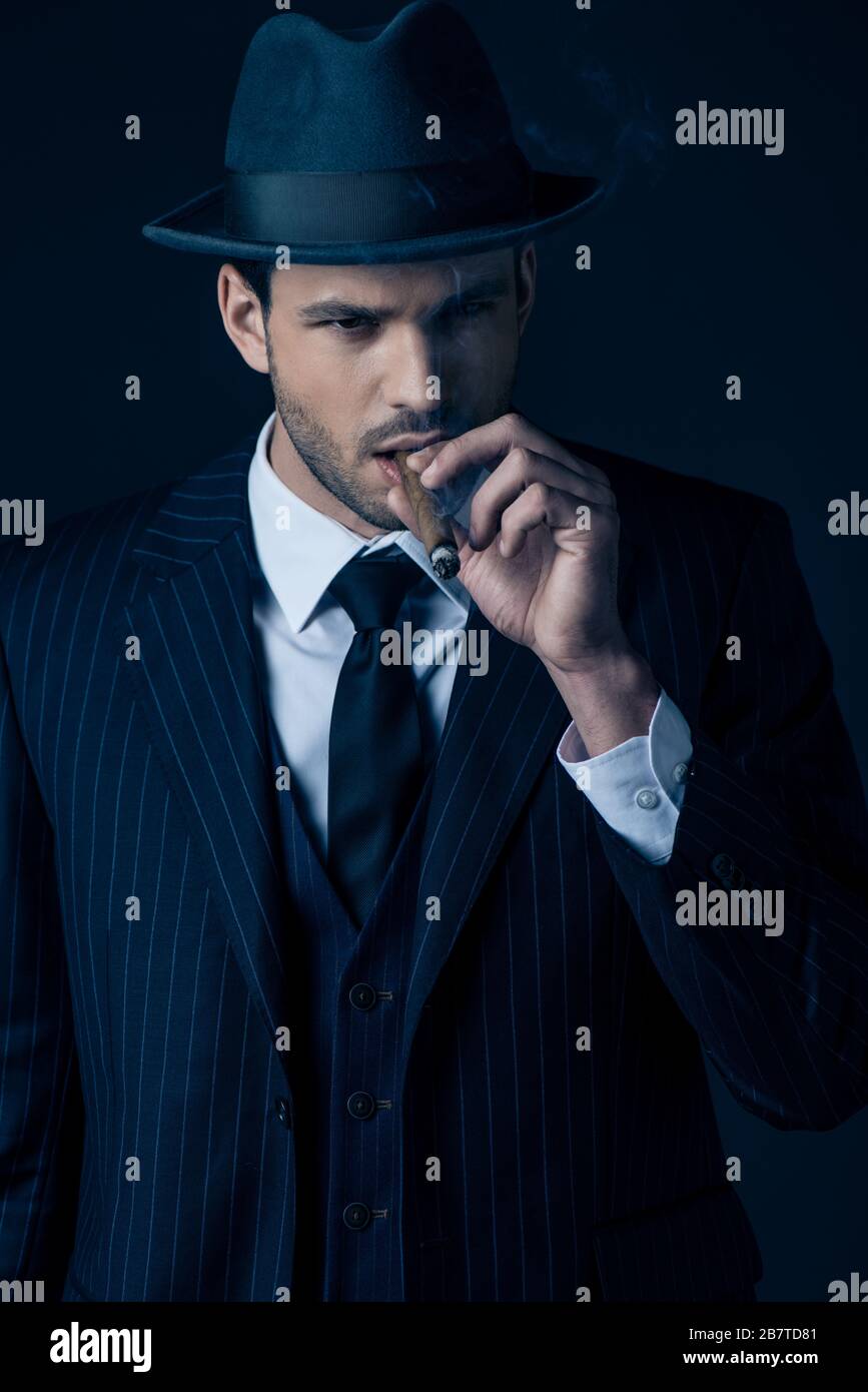 Young gangster hat smoking cigar hi-res stock photography and images ...