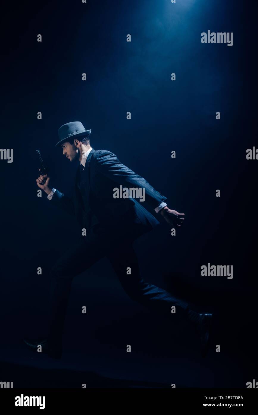 Man running gun hi-res stock photography and images - Alamy