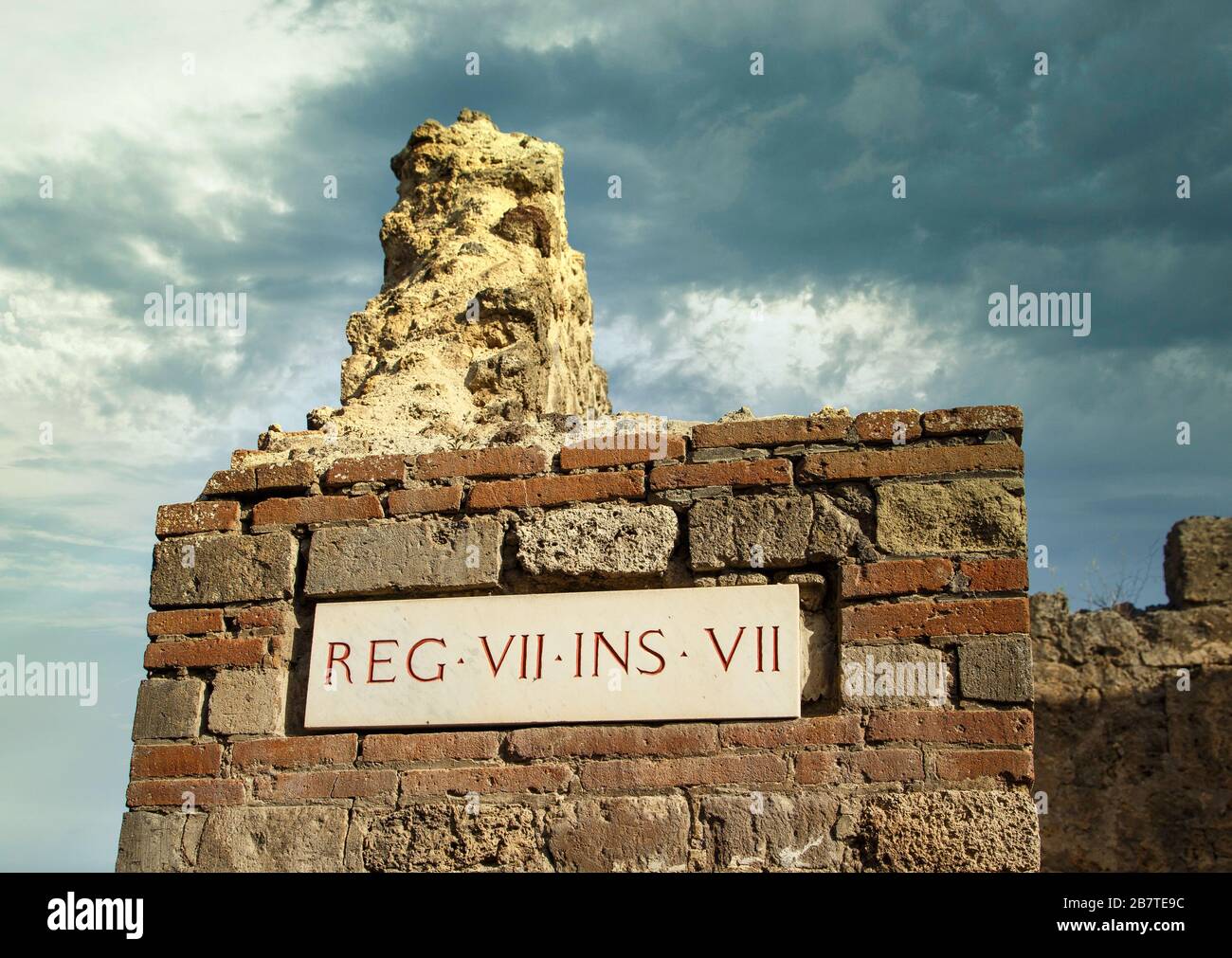 Latin Plaque on Ancient Column in Pompeii Stock Photo - Alamy