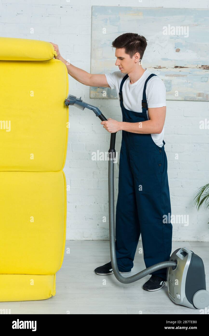 Side view handsome cleaner hi-res stock photography and images - Alamy