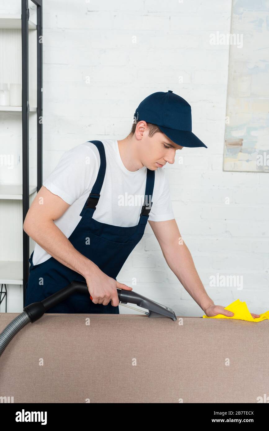 Man removing overalls hi-res stock photography and images - Alamy