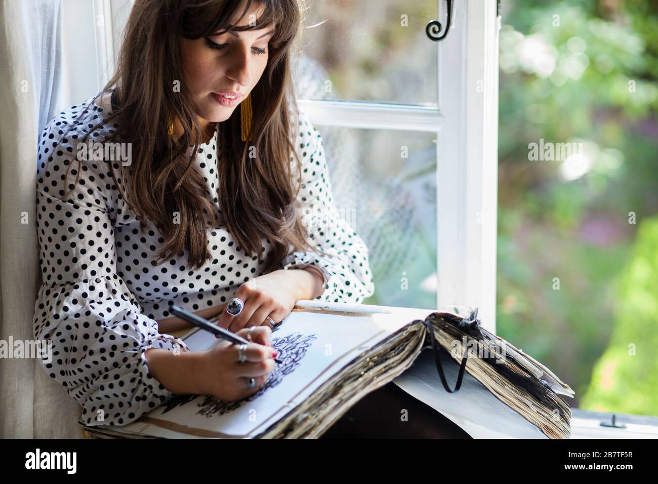 Woman Sitting by Window Drawing Stock Photo - Alamy