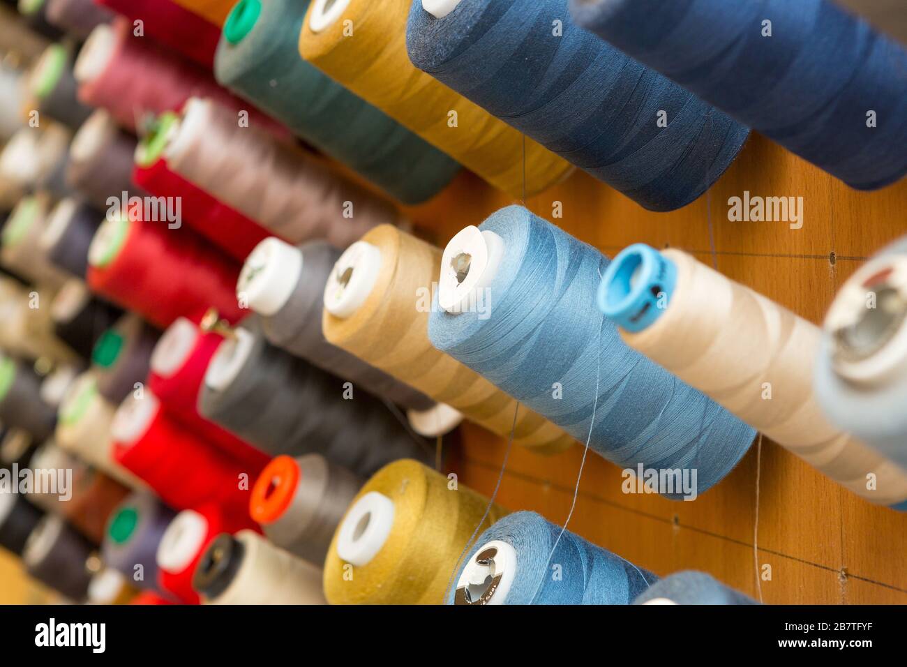 Mending clothes hi-res stock photography and images - Alamy