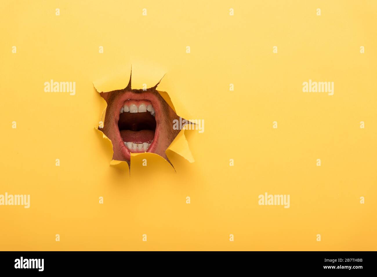 Mouth ripped open hi-res stock photography and images - Alamy