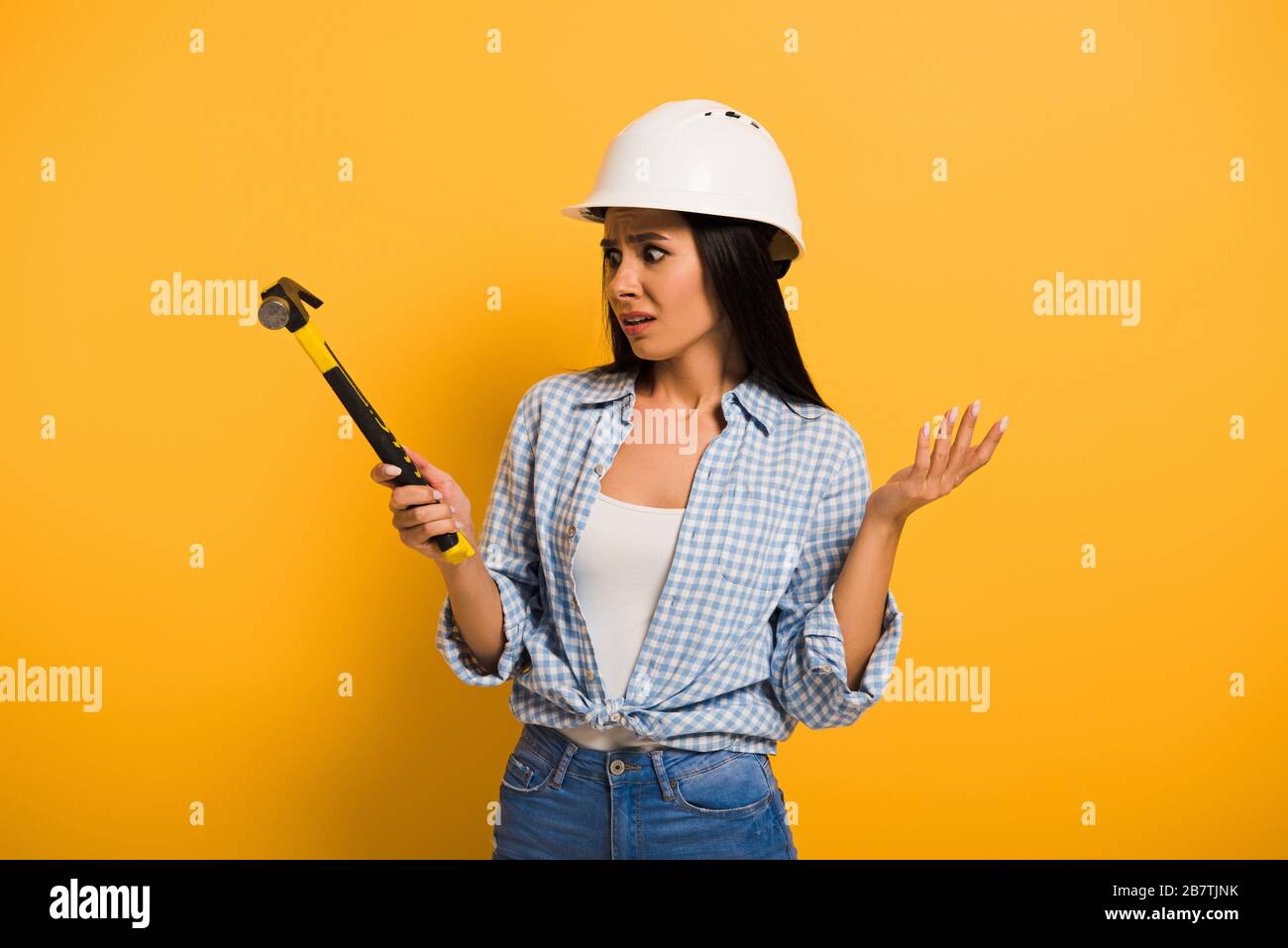 Confused female worker hi-res stock photography and images - Alamy