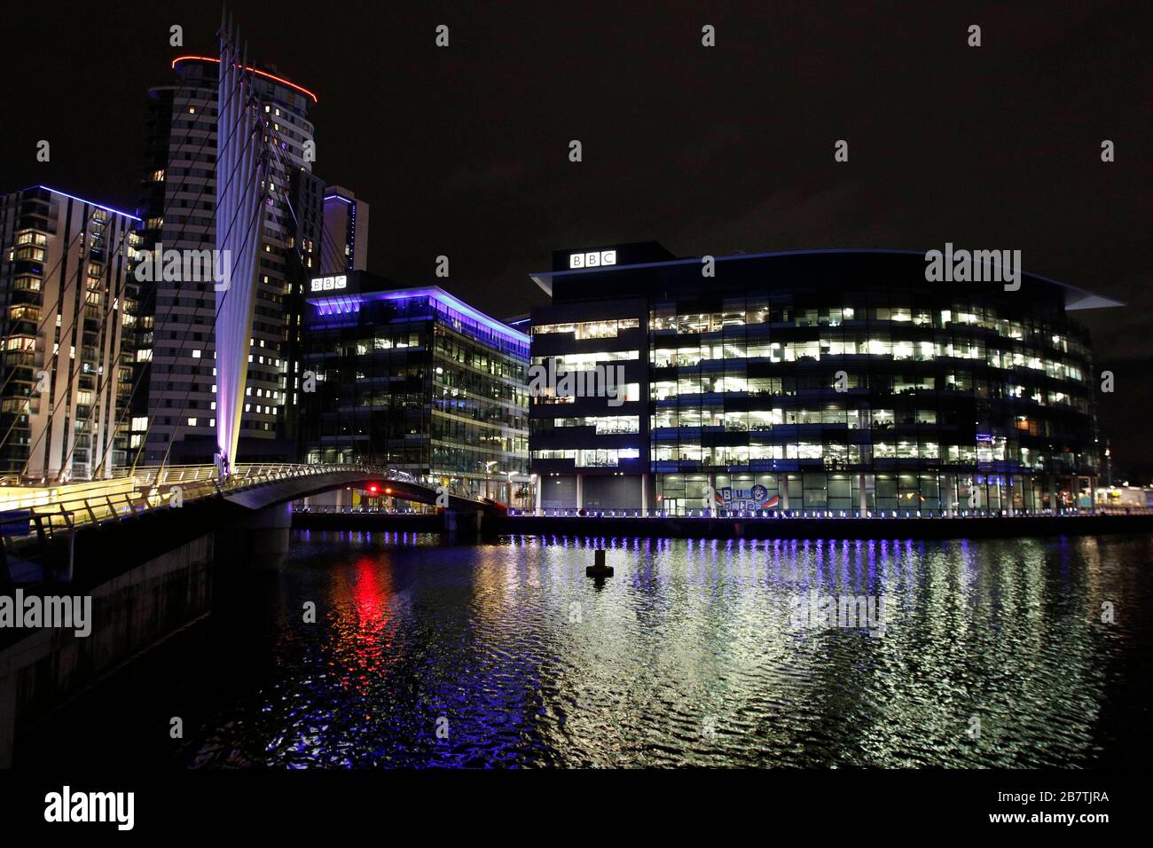 MediaCityUK BBC buildings, seen at night, at Salford Quays, near ...