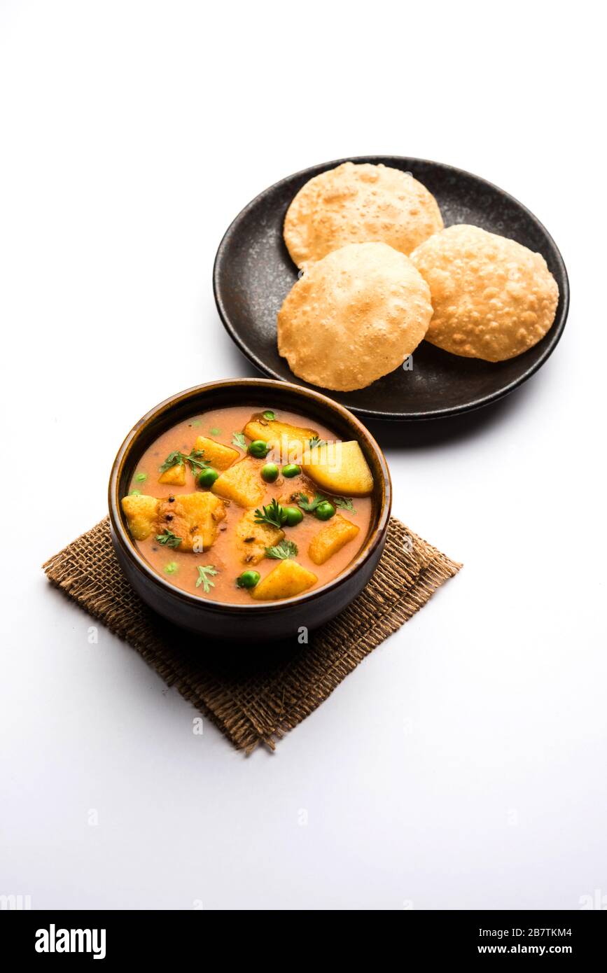 Aloo Puri or Potato curry with fried Poori, popular Indian breakfast ...
