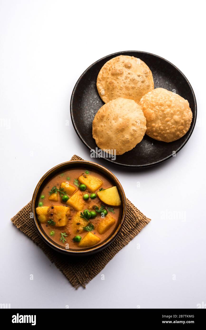 Aloo Puri or Potato curry with fried Poori, popular Indian breakfast ...