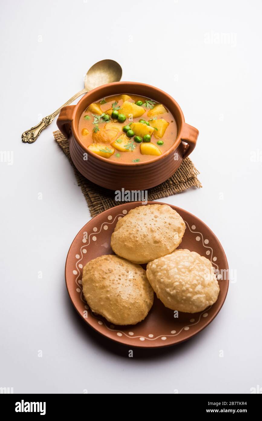 Aloo Puri or Potato curry with fried Poori, popular Indian breakfast ...