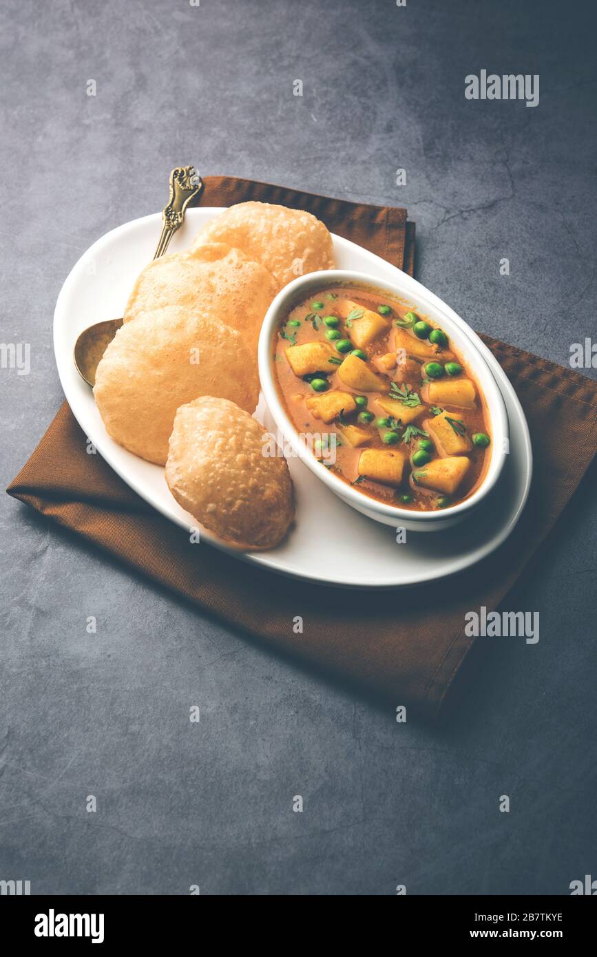 Aloo Puri or Potato curry with fried Poori, popular Indian breakfast ...