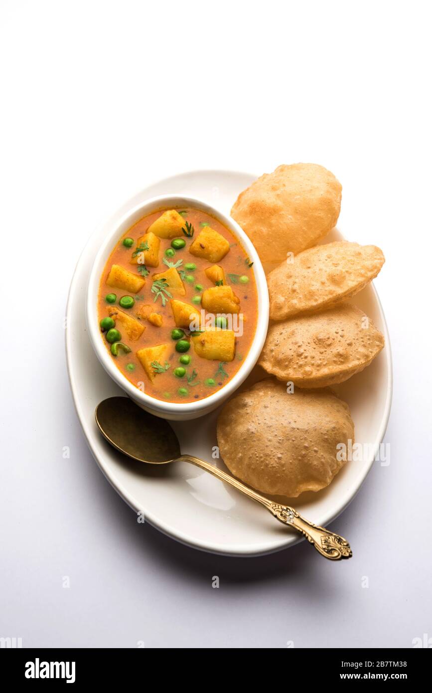 Aloo Puri or Potato curry with fried Poori, popular Indian breakfast ...