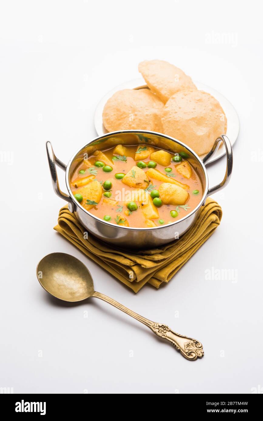 Aloo Puri or Potato curry with fried Poori, popular Indian breakfast ...