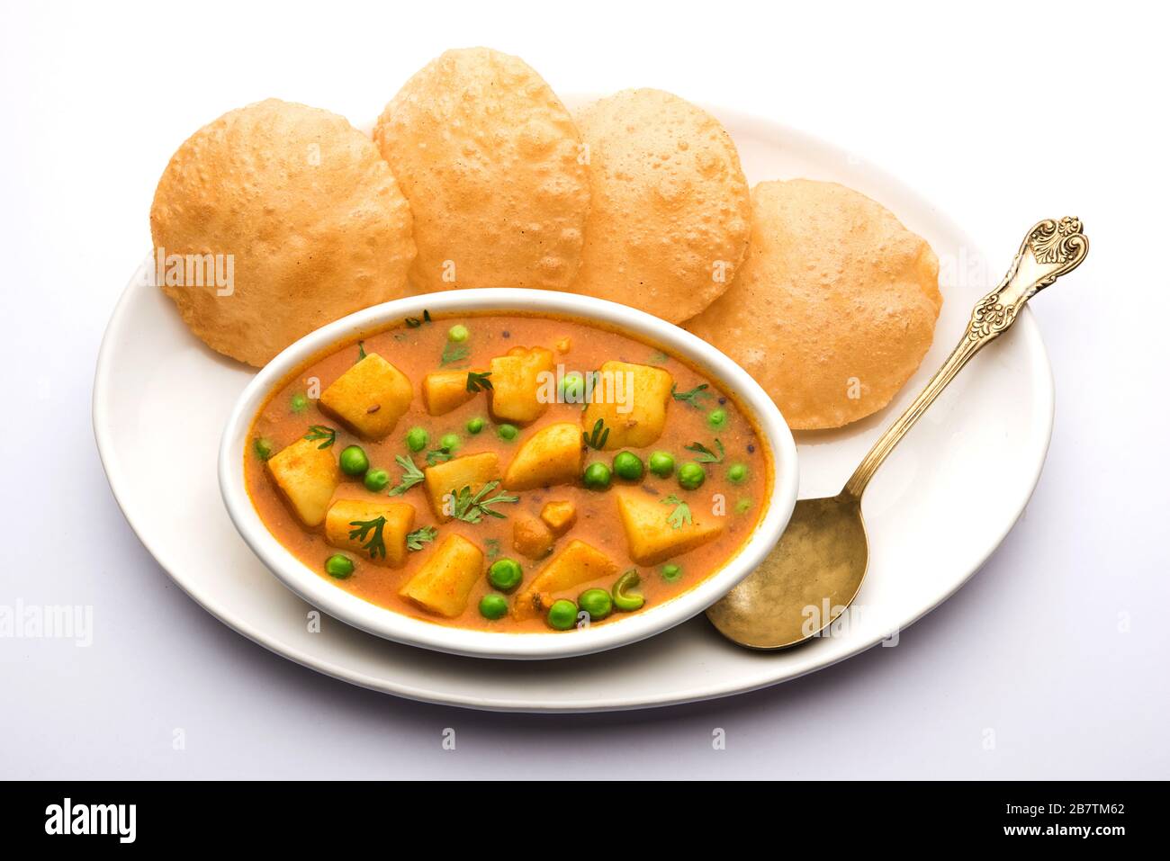 Aloo Puri or Potato curry with fried Poori, popular Indian breakfast ...