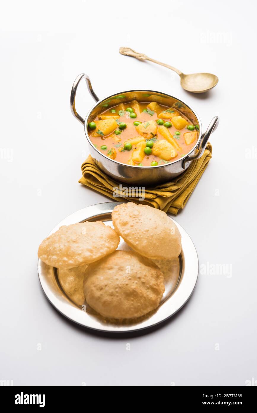 Aloo Puri or Potato curry with fried Poori, popular Indian breakfast ...