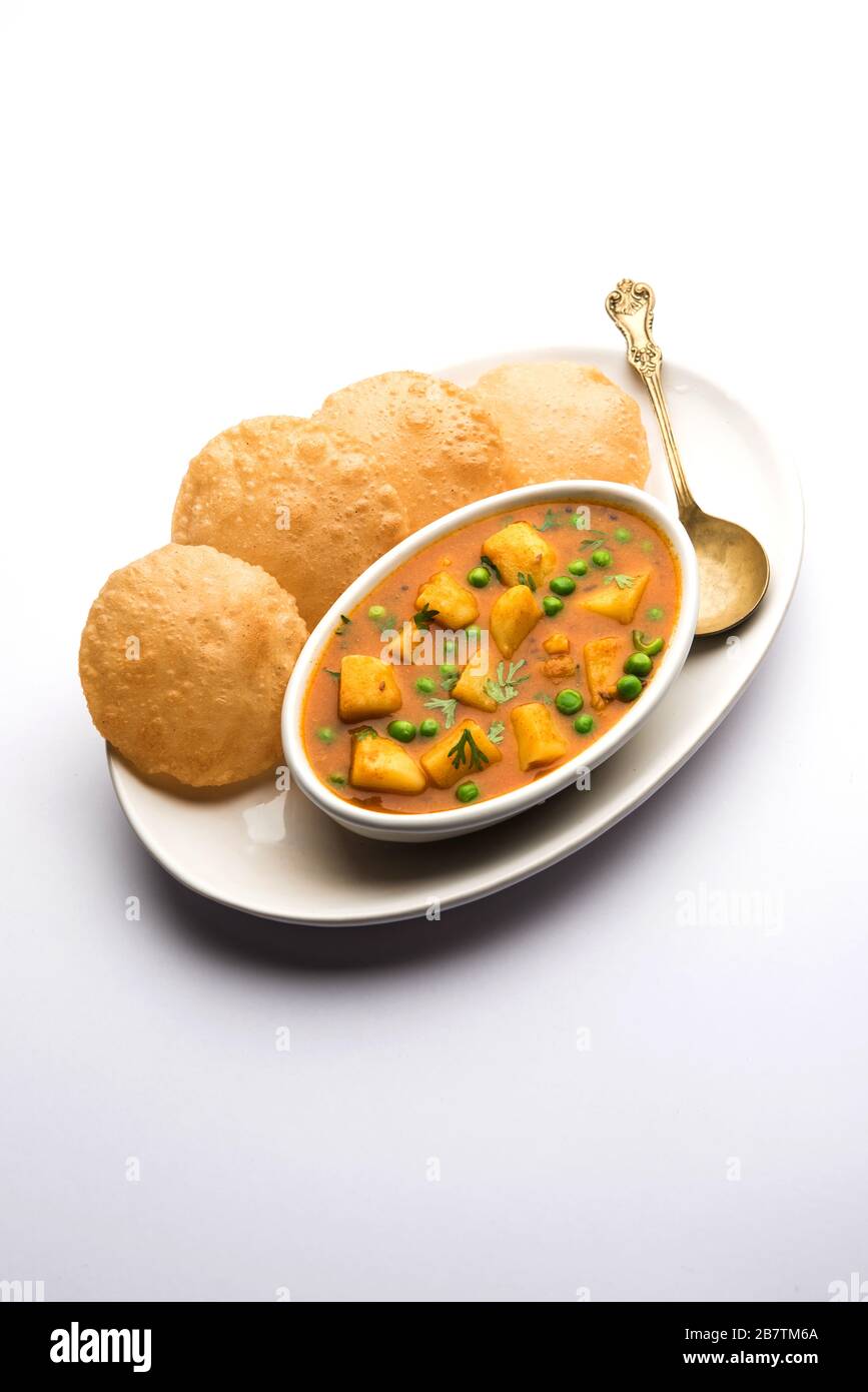 Aloo Puri or Potato curry with fried Poori, popular Indian breakfast ...