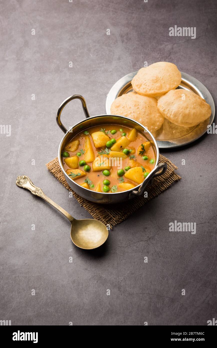 Aloo Puri or Potato curry with fried Poori, popular Indian breakfast ...