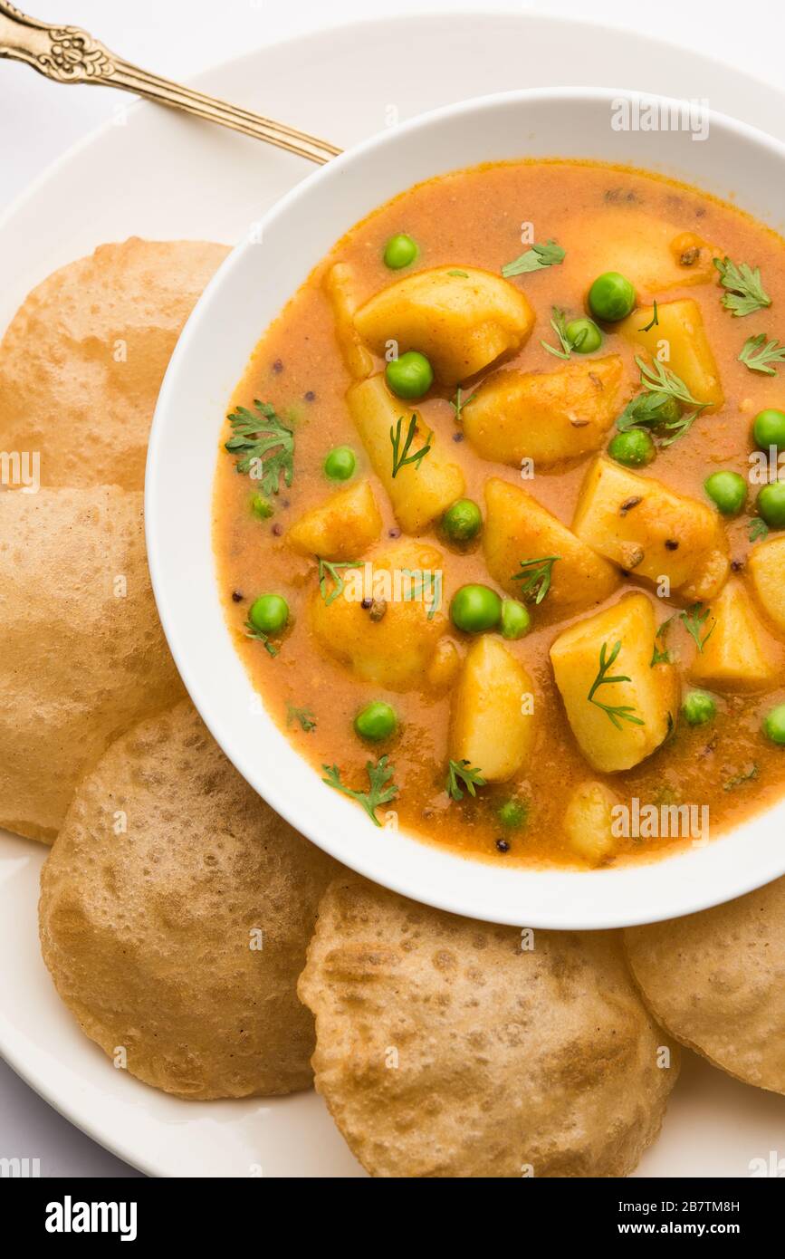 Aloo Puri or Potato curry with fried Poori, popular Indian breakfast ...