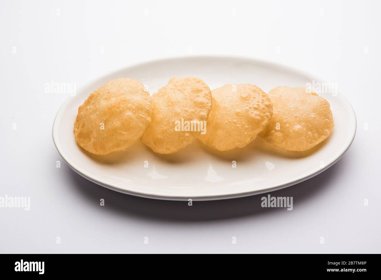 Indian fried puri bread hi-res stock photography and images - Alamy